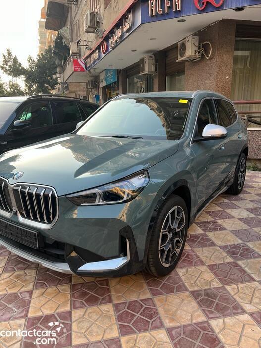 BMW X1 2024 Turquoise New in Nasr City (c7326976f690)